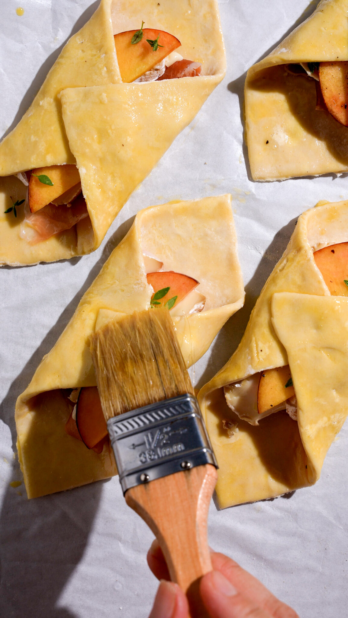 Easy Peach Brie Prosciutto Puff Pastry - Chasing Cravings